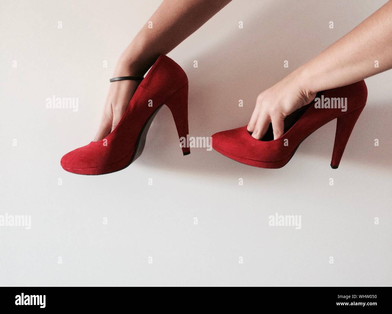 Holding up high hi-res stock photography and images - Alamy