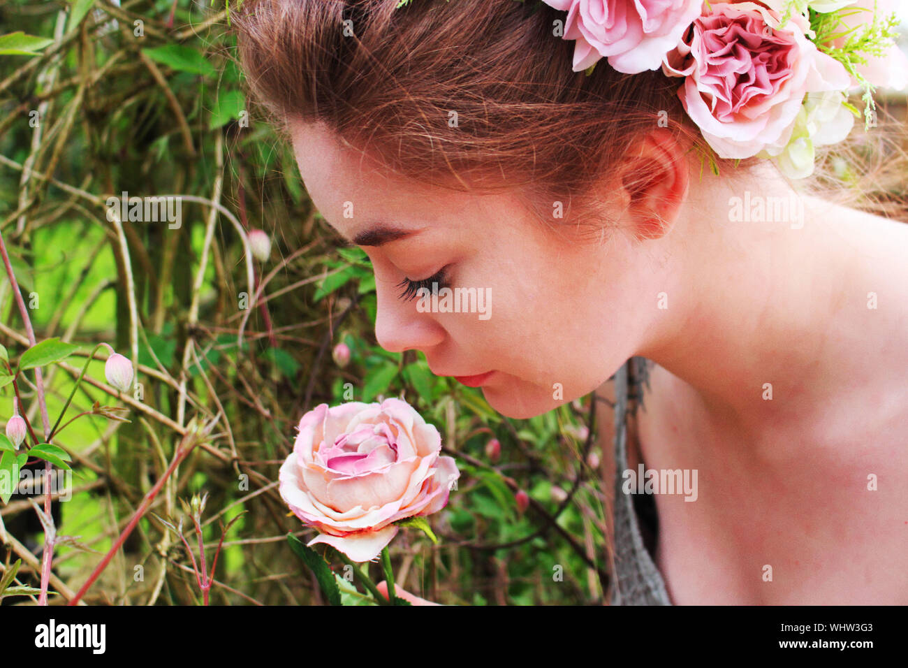 Woman Smelling Rose High Resolution Stock Photography and Images - Alamy
