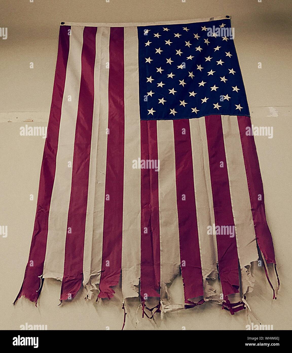 American flag hanging on wall hi-res stock photography and images - Alamy
