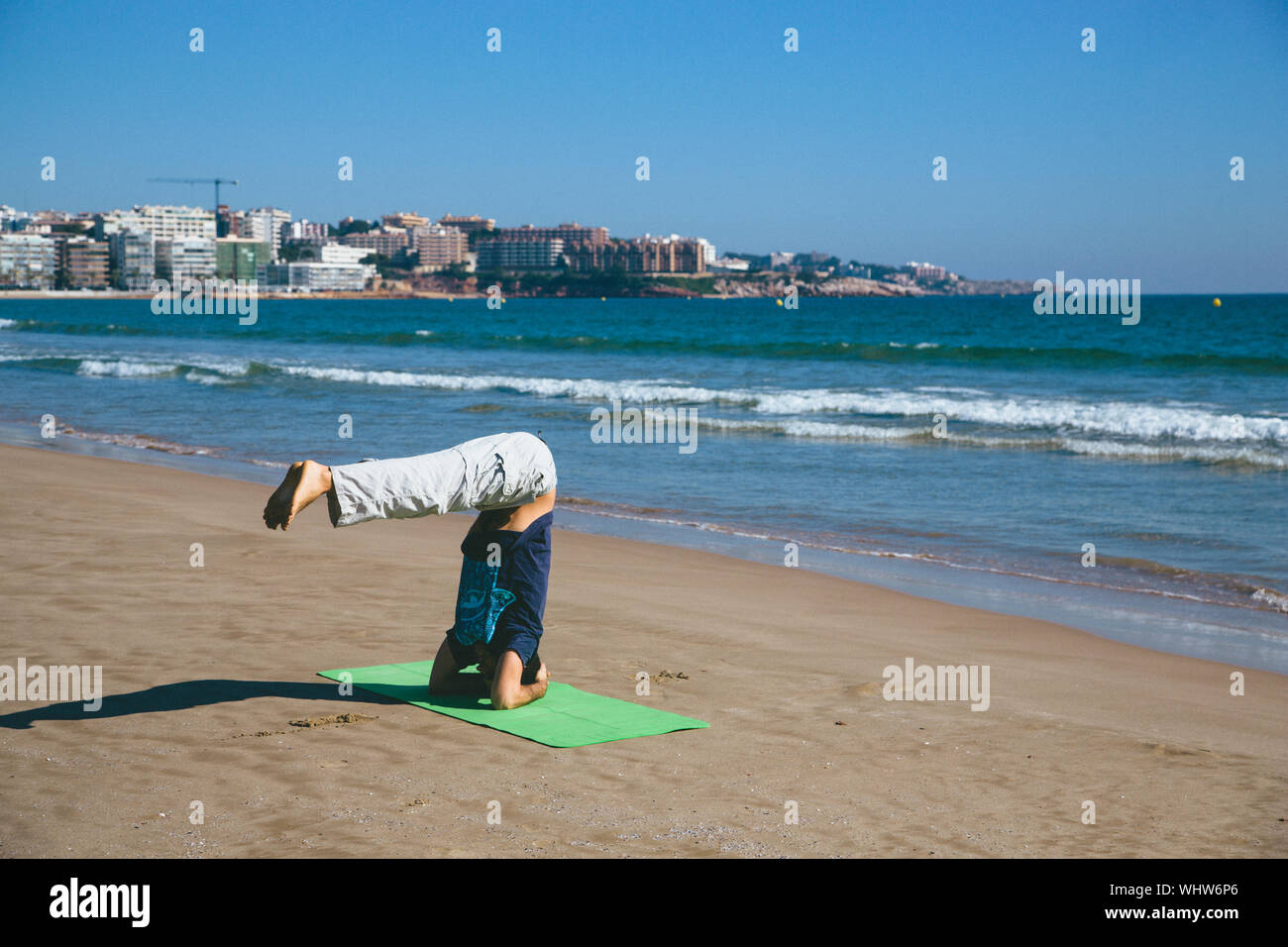 Doing handstand in sea hi-res stock photography and images - Alamy