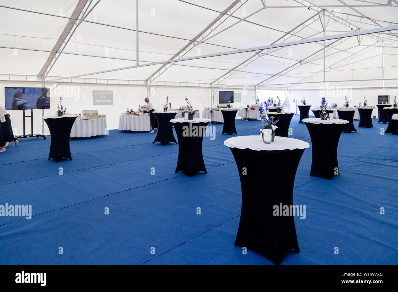 Russia Kemerovo 2019-07-27 Catering, high buffet tables with black ...