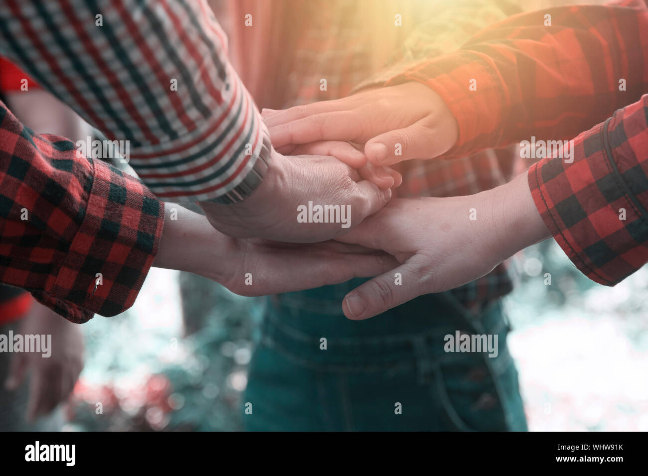 Linked hands hi-res stock photography and images - Alamy