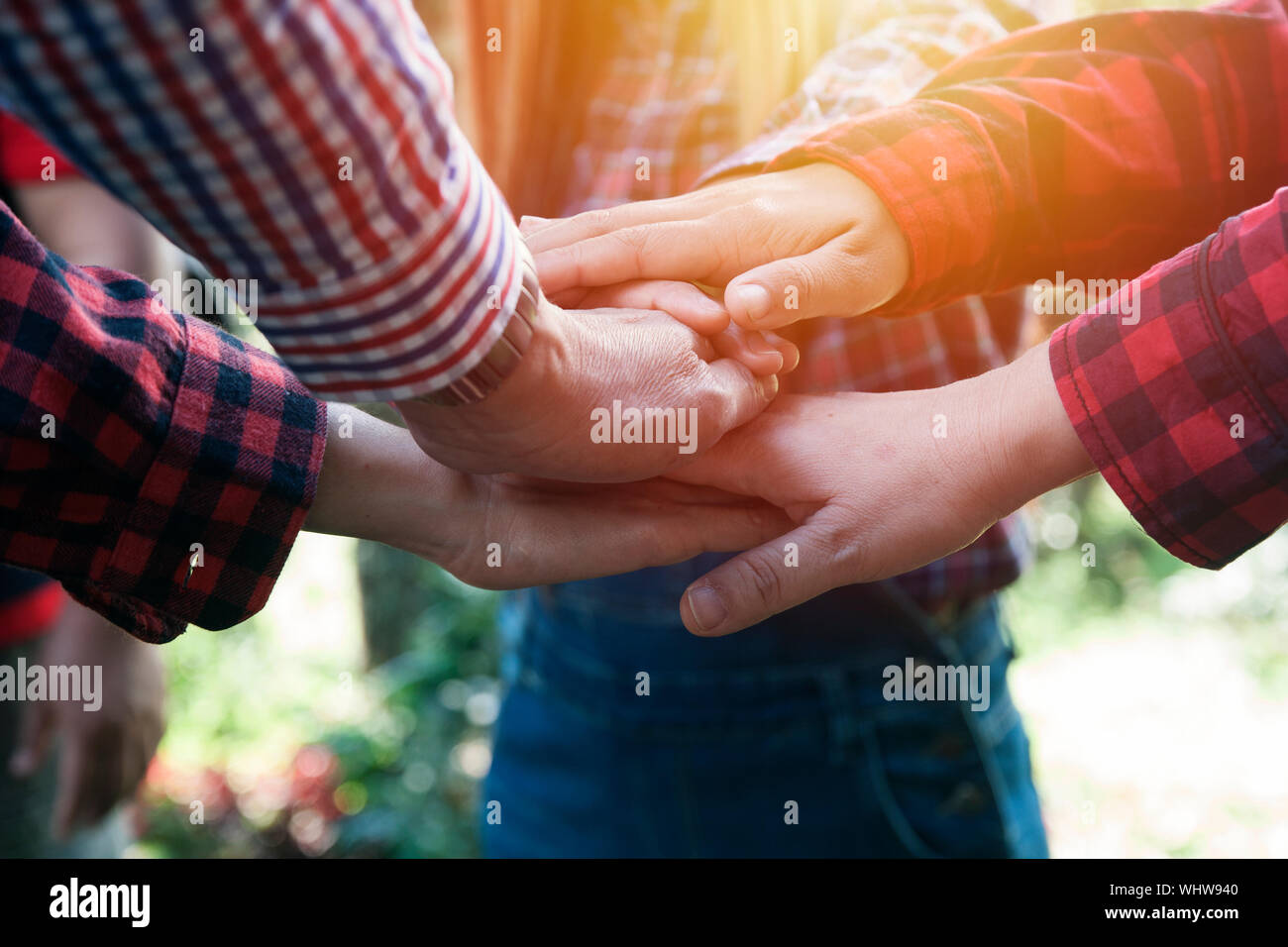 Linked hands hi-res stock photography and images - Alamy