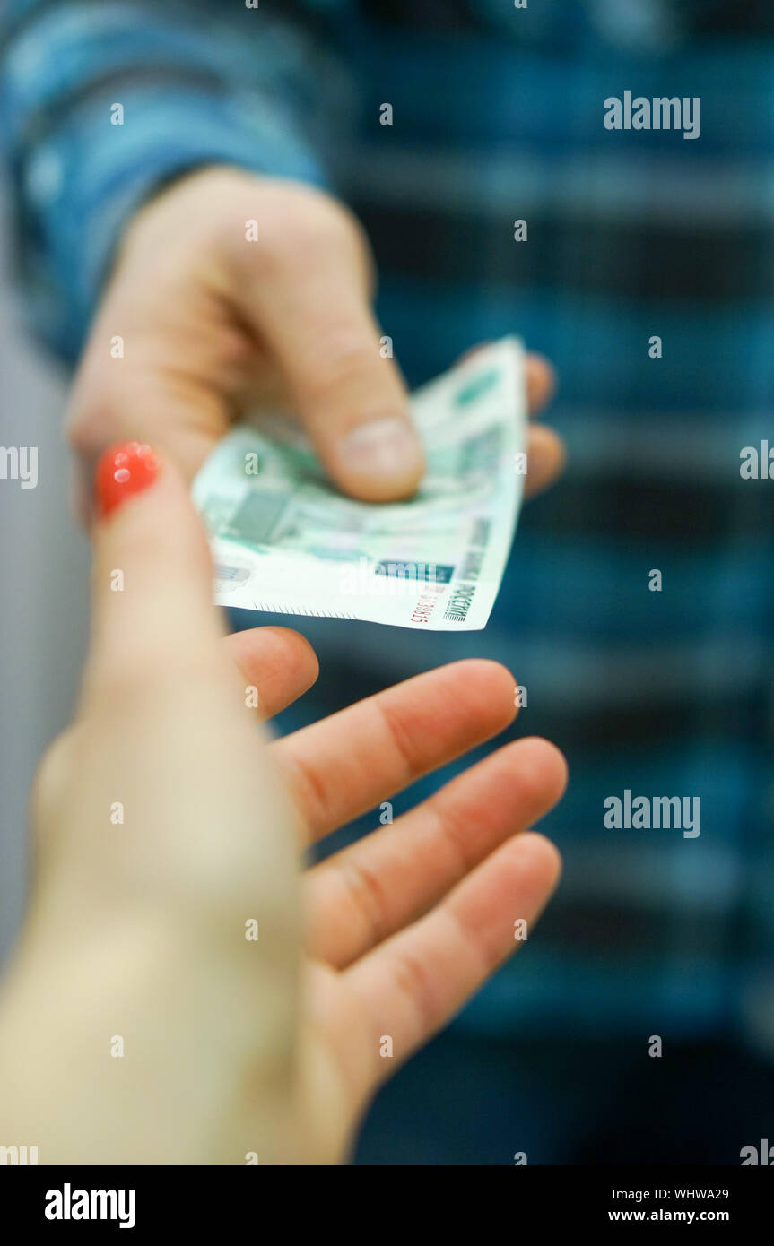 Hand receiving money hi-res stock photography and images - Alamy