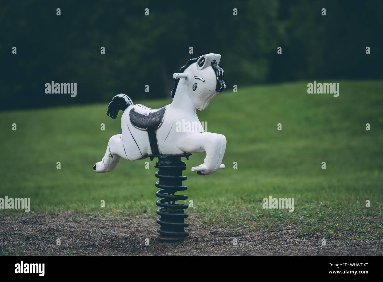 Playground with rocking horse hi-res stock photography and images - Alamy