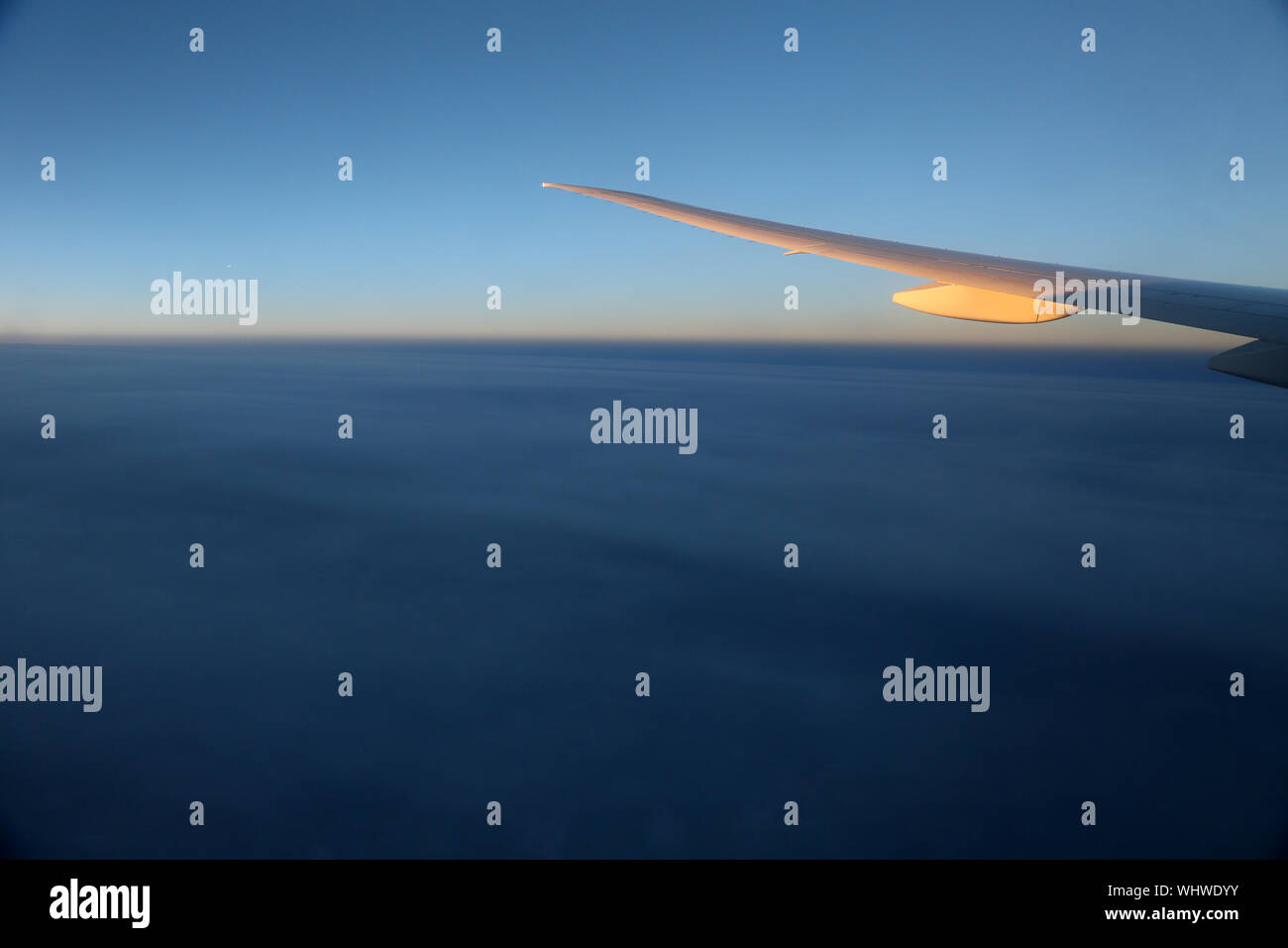 Airplane In Sky Sunset Over Ocean High Resolution Stock Photography and ...