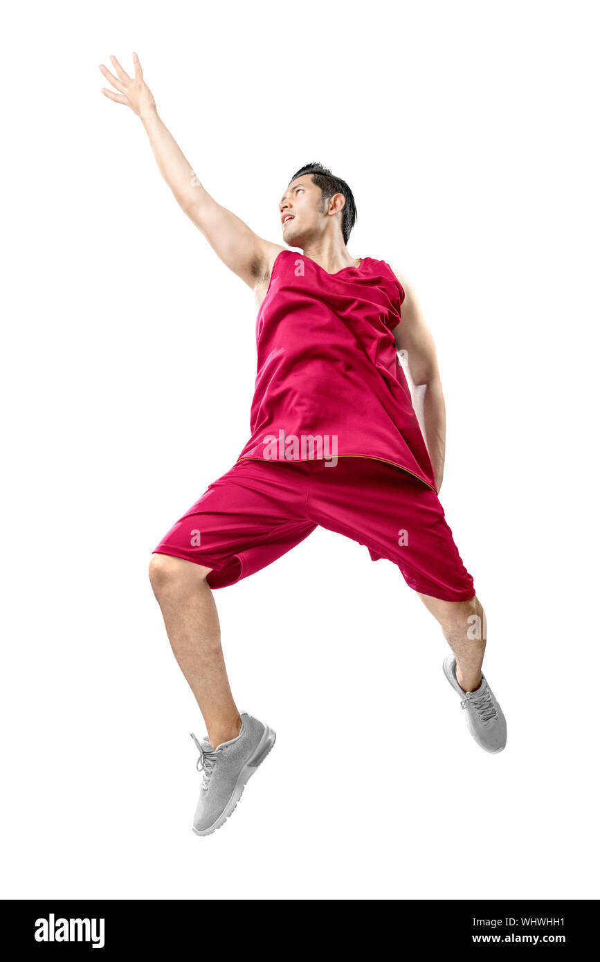 Asian man basketball player jump in the air isolated over white ...