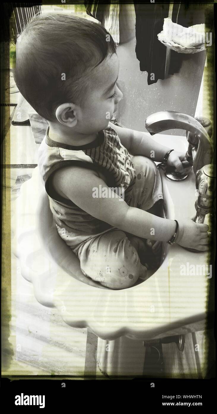Boy In Sink High Resolution Stock Photography and Images - Alamy