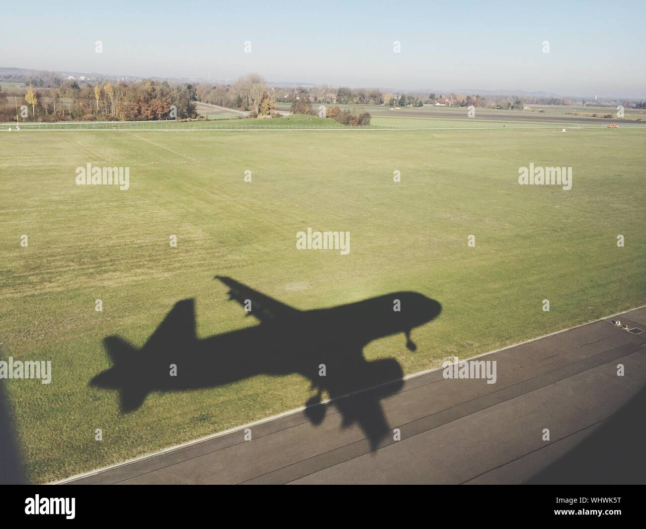 Airplane shadow on field hi-res stock photography and images - Alamy