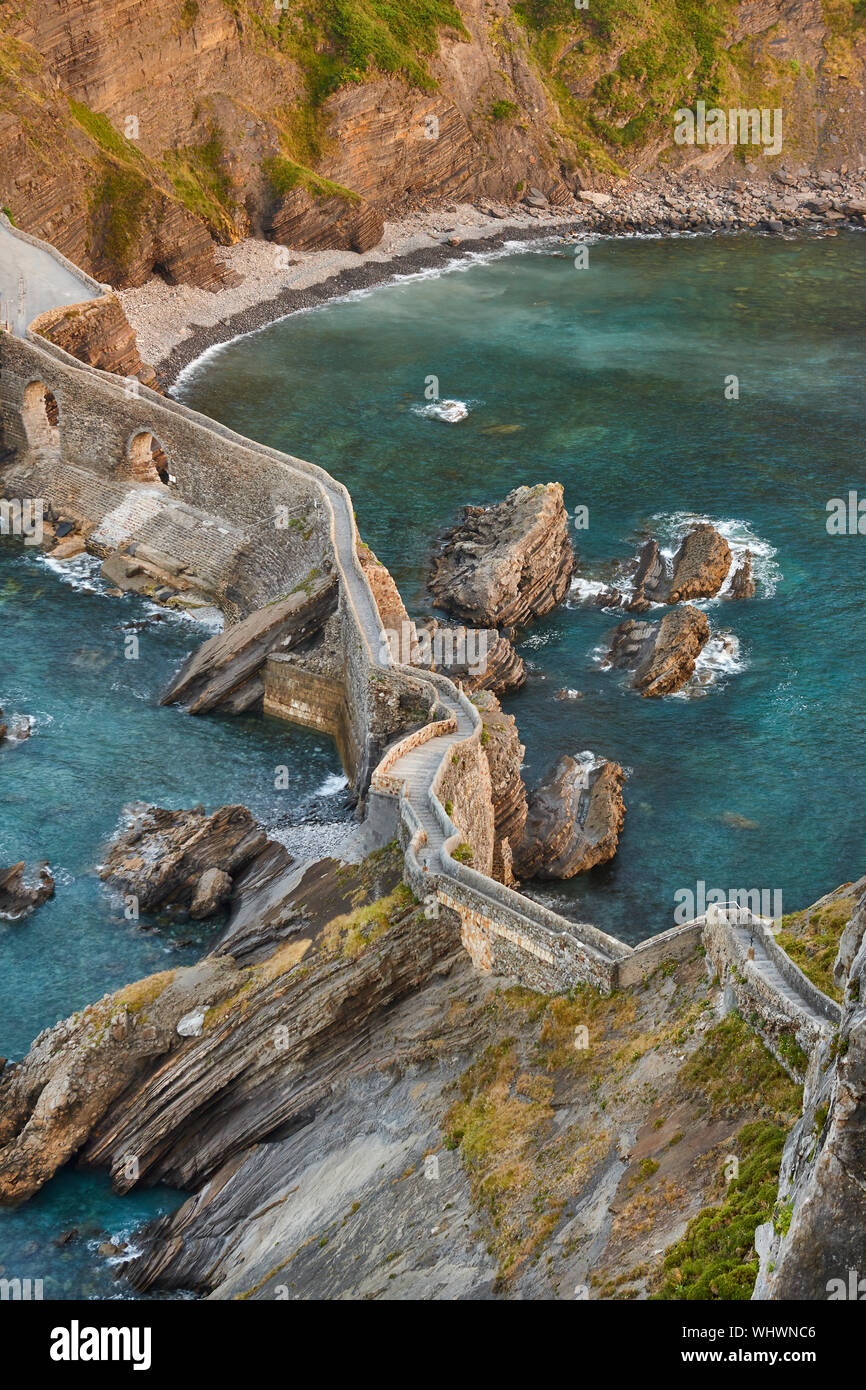 Sunset dramatic coastline in Spain. San Juan de Gaztelugatxe. Basque ...