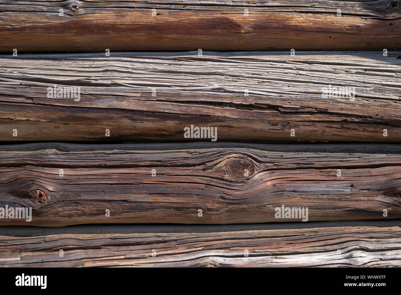 Background texture of old weathered wood cladding on a wall with ...