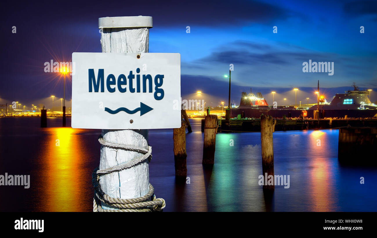 Street Sign the Direction Way to Meeting Stock Photo - Alamy