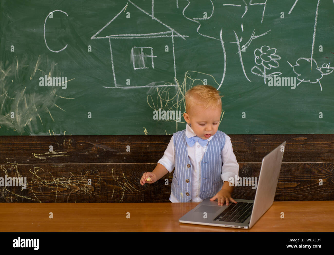 Preschool kid study with e-learning technology in school. E-learning ...