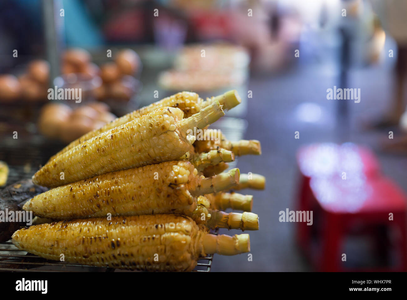 Street food, grilled corn stand in Asia Stock Photo - Alamy