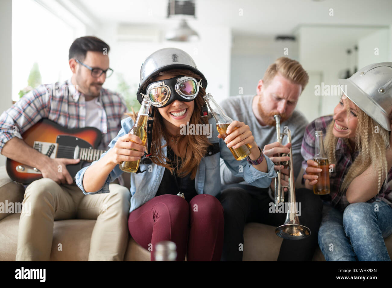 Group of friends having fun together, talking, laughing and enjoying ...