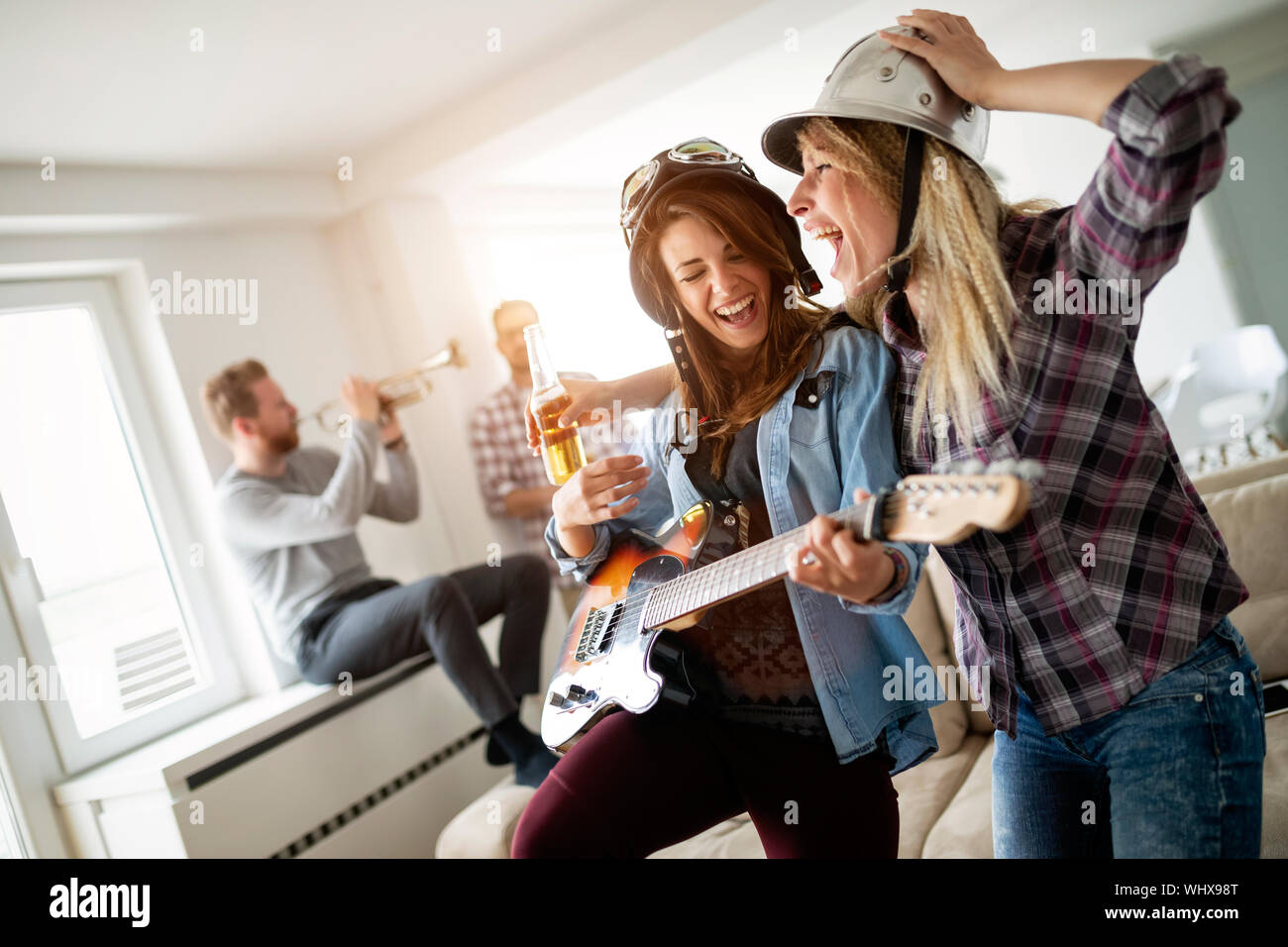 Group of friends having fun together, talking, laughing and enjoying ...