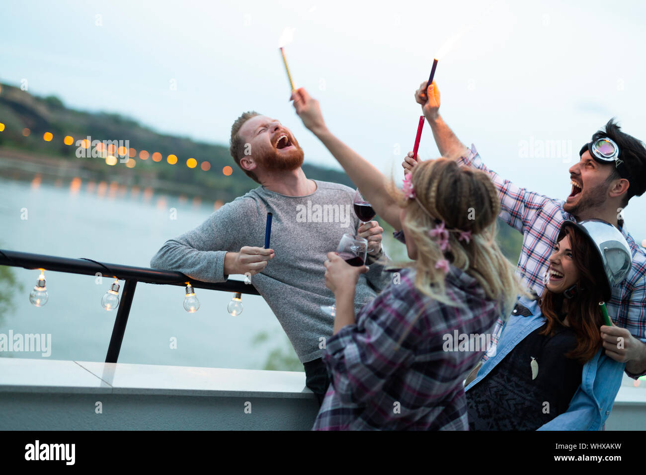 Group of friends relaxing, having fun and hanging out together Stock ...
