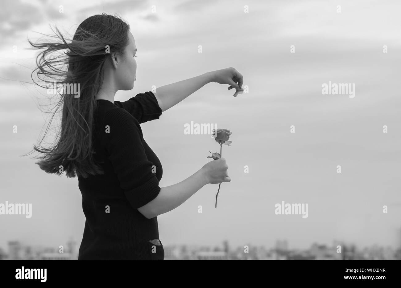 Black and white photo, Caucasian woman in somber scene Stock Photo - Alamy