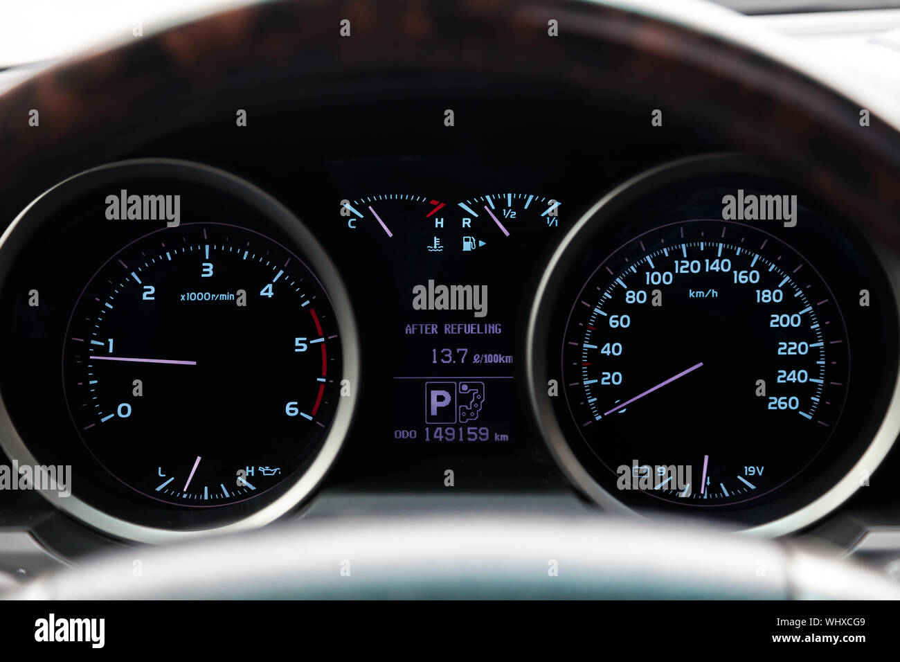 Car dashboard with instruments and dial speedometer tachometer, fuel ...