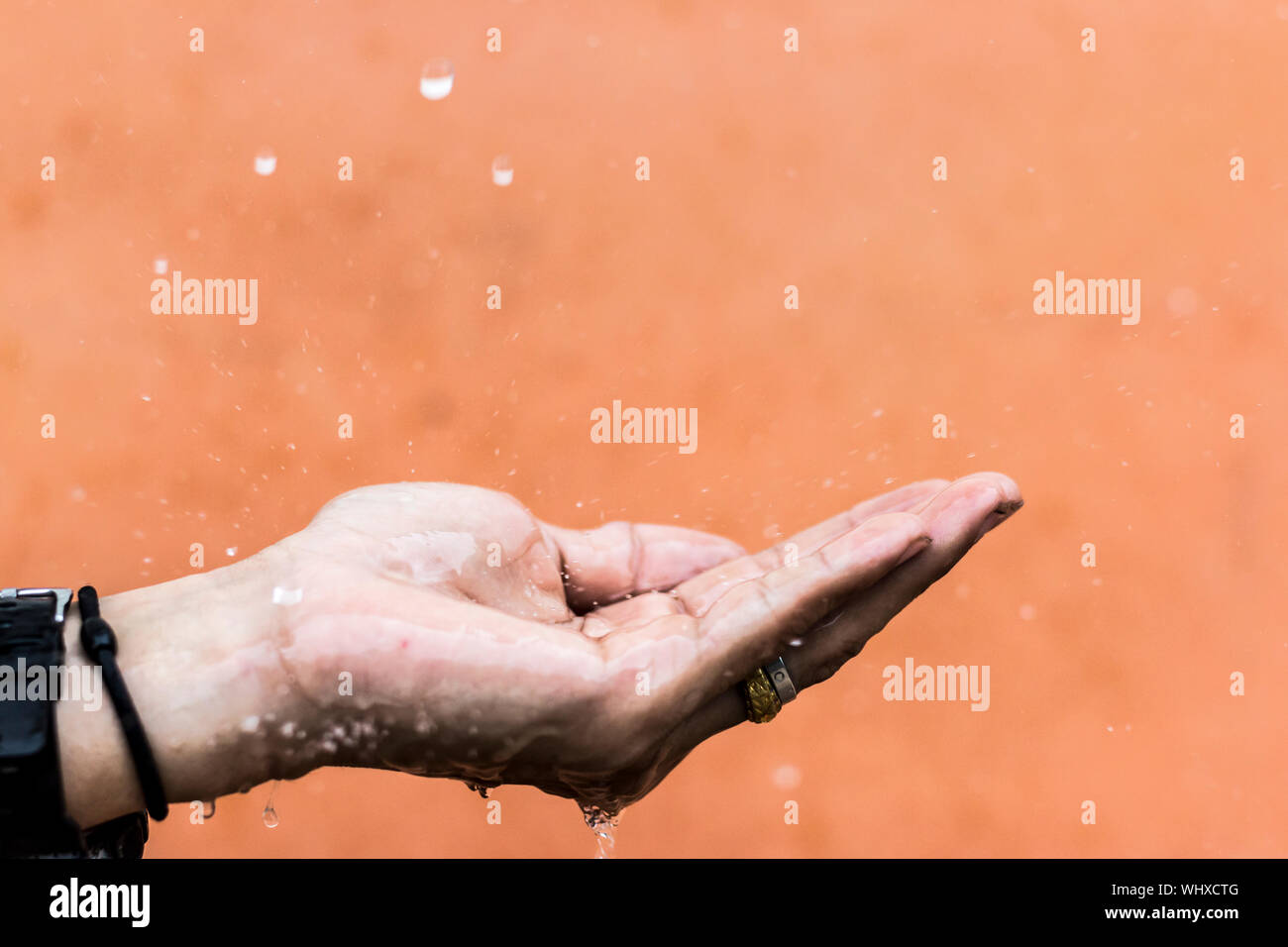 Human hand splashing water hi-res stock photography and images - Alamy