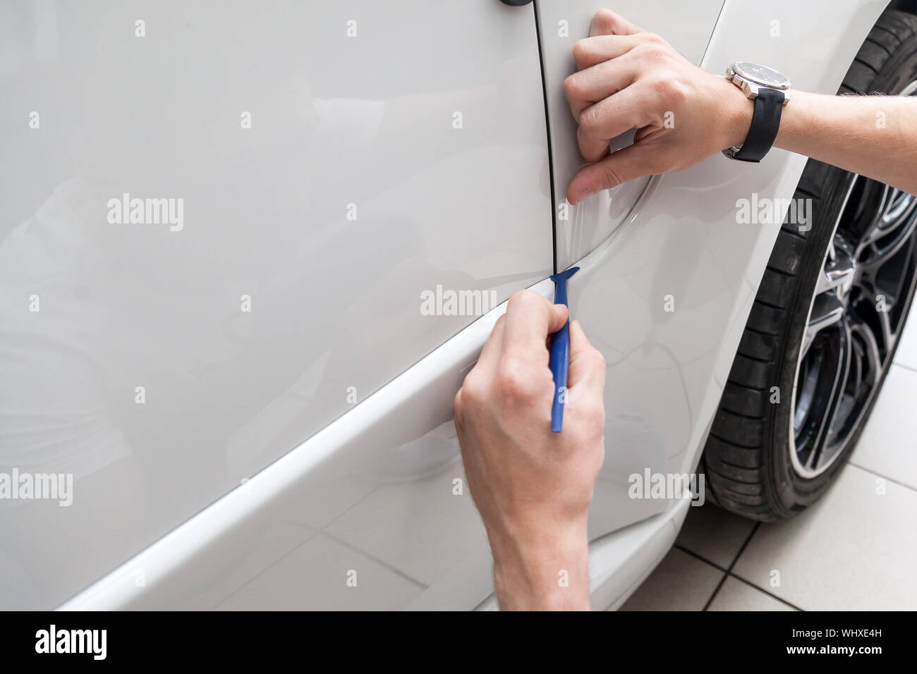 Retrofitting the car with a solid transparent protective film, the ...