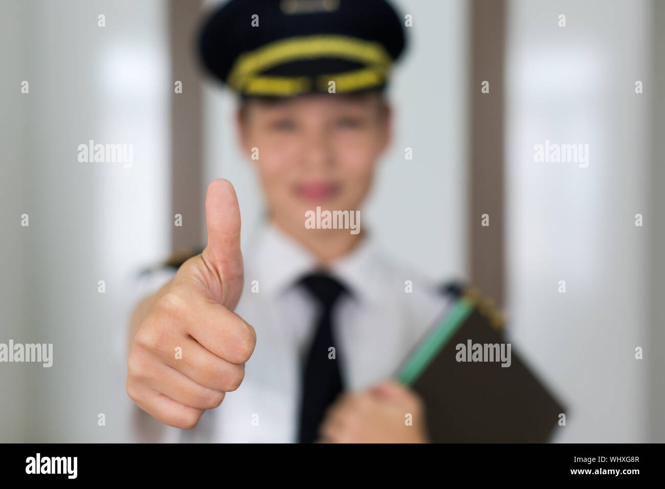 Professional woman pilot portrait Stock Photo - Alamy