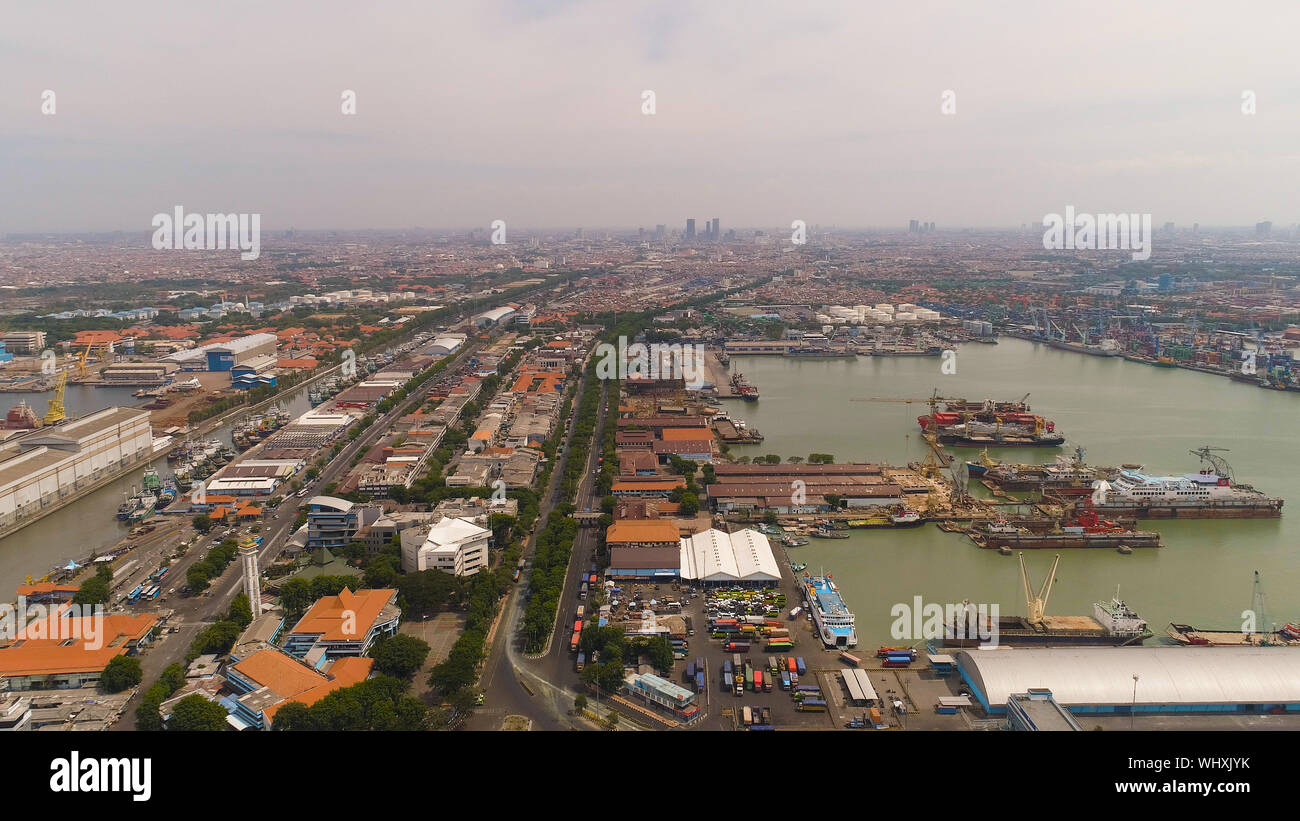 aerial view cargo and passenger seaport with ships and crane Tanjung ...