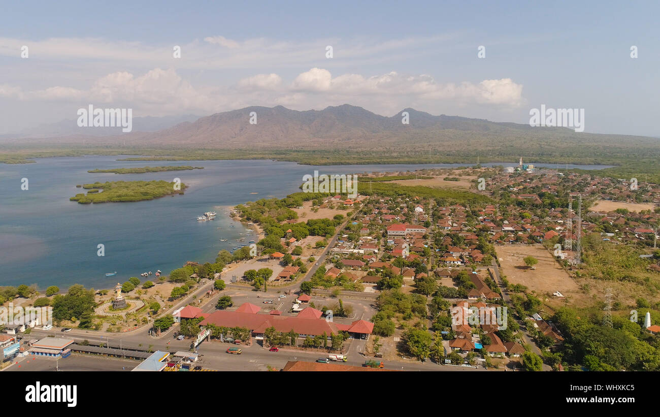 Aerial view ferry port gilimanuk with ferry boats, vehicles. Ferries ...