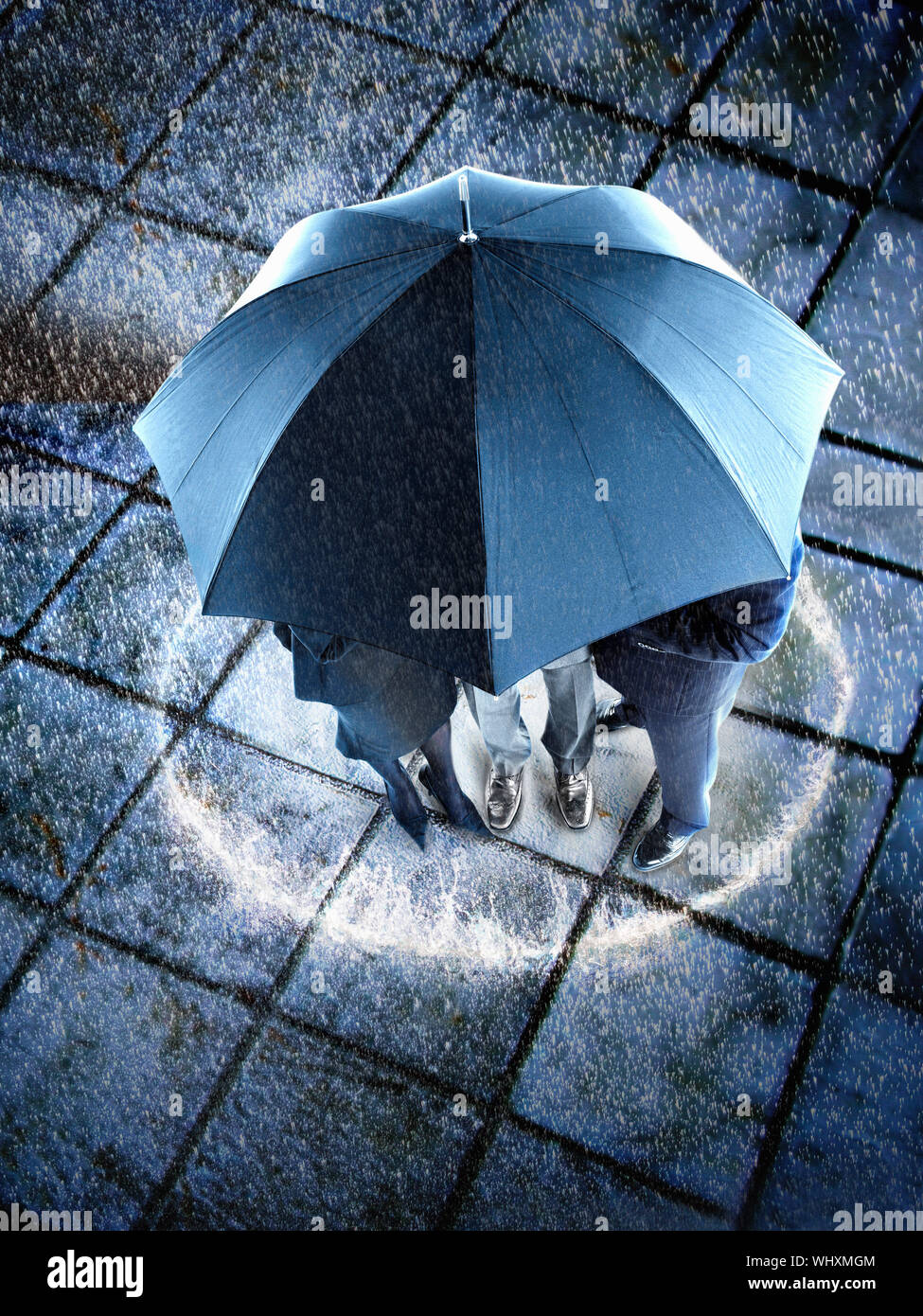 Group under one umbrella hi-res stock photography and images - Alamy