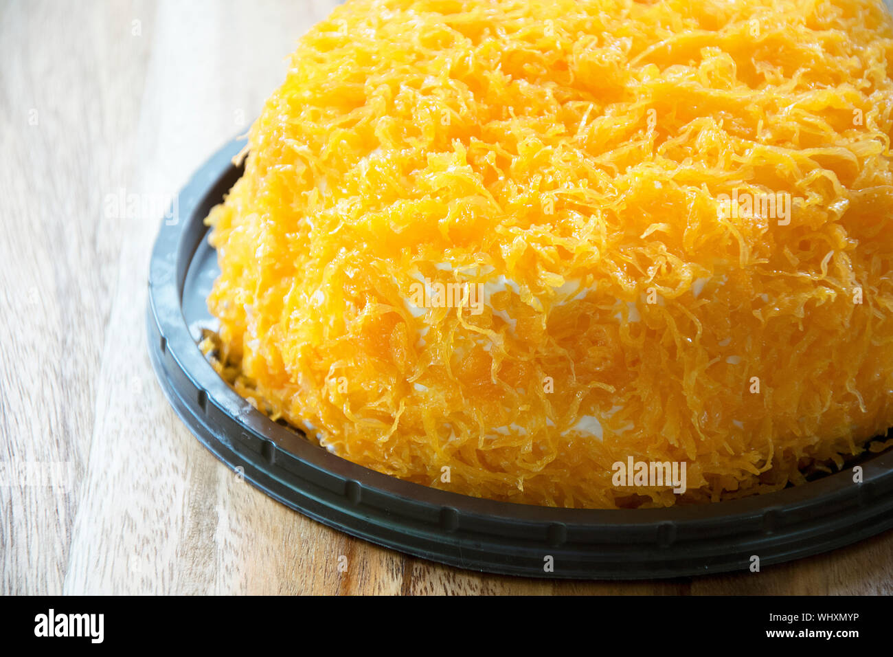 Gold Egg Yolks Thread cake Stock Photo - Alamy