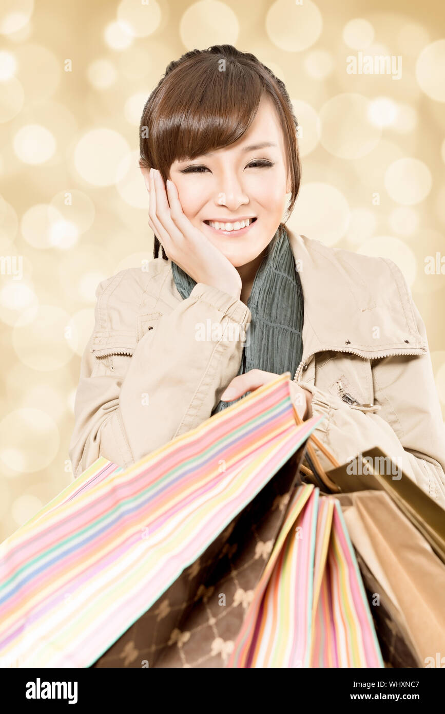 Happy smiling shopping girl, closeup portrait Stock Photo - Alamy