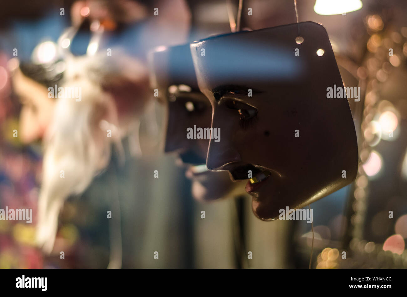 Two masks hanging hi-res stock photography and images - Alamy