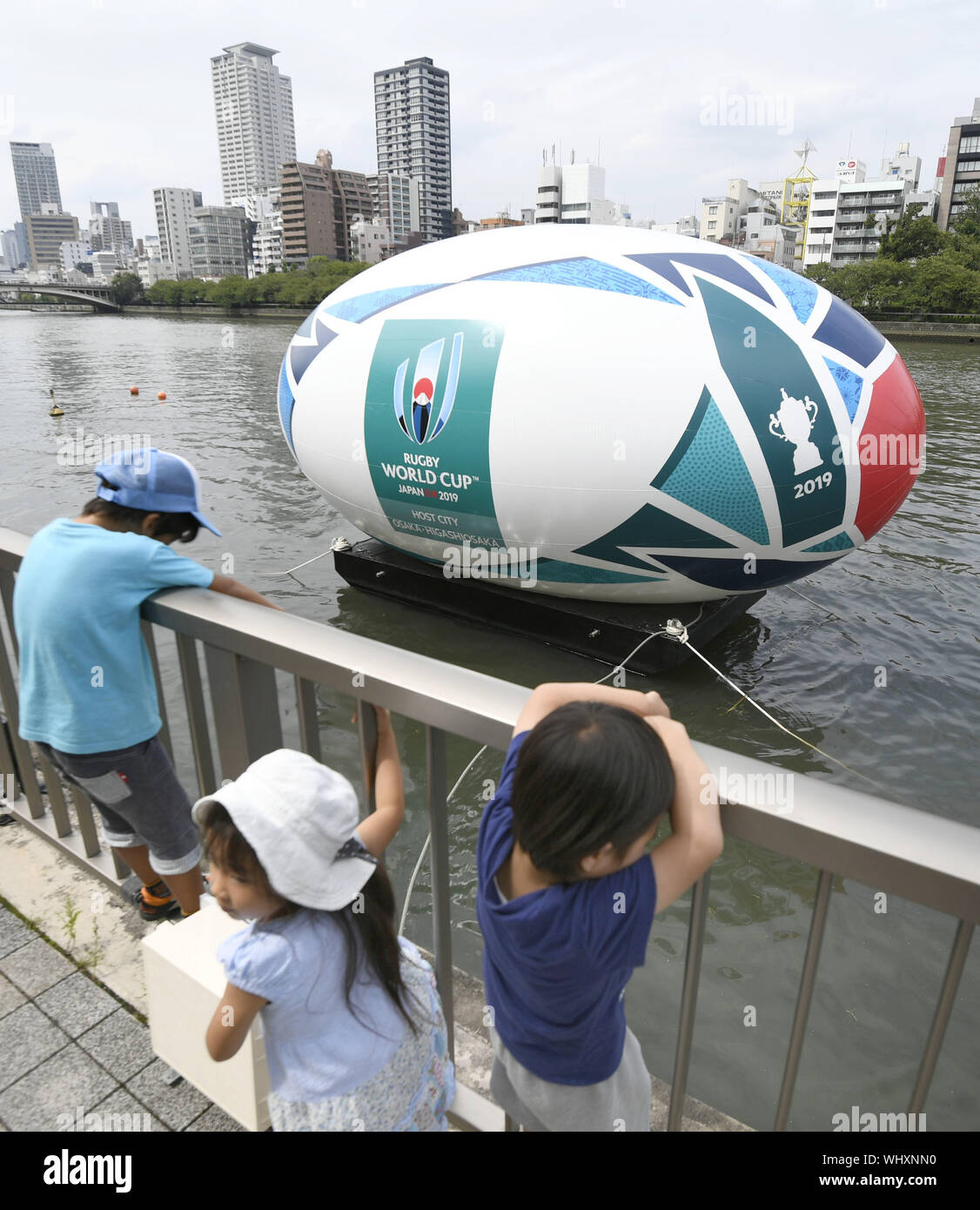 A balloon in the shape of a rugby ball floats on Sept. 1, 2019, on a ...