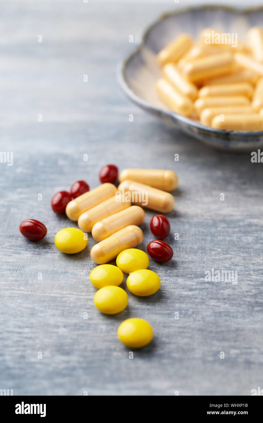 Vitamin C, Beta-Carotene tablets and Coenzyme Q10 capsules ...