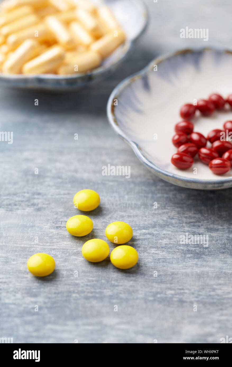 Vitamin C, Beta-Carotene tablets and Coenzyme Q10 capsules ...