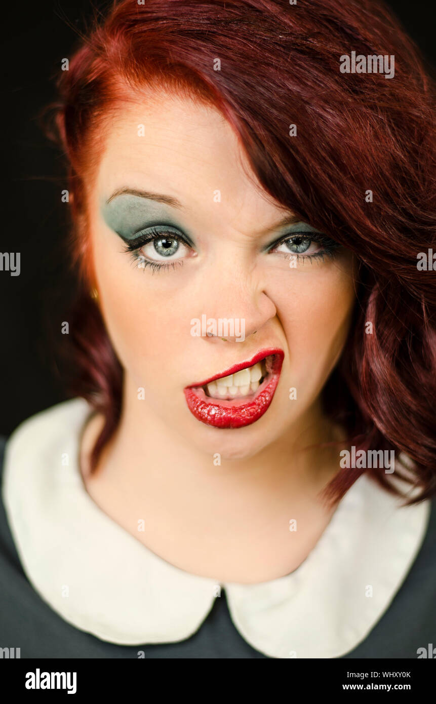 Portrait woman snarling hi-res stock photography and images - Alamy