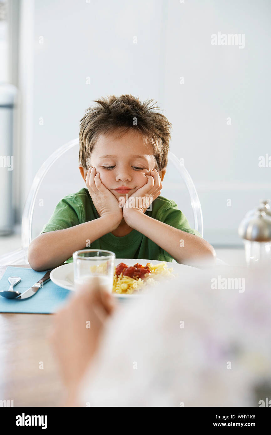 Child bored food plate hi-res stock photography and images - Alamy