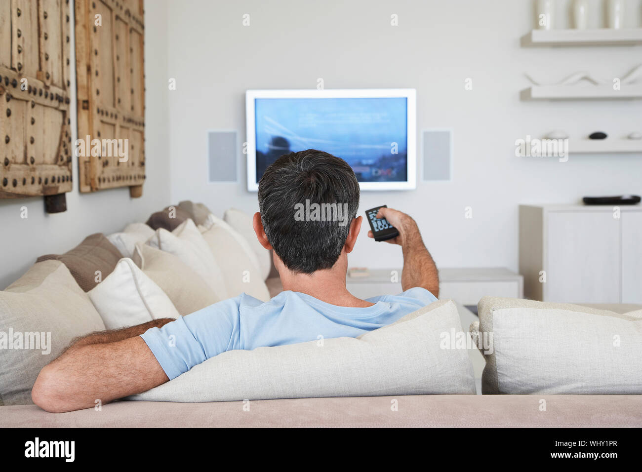 Male Watching Tv Middle Age High Resolution Stock Photography and ...