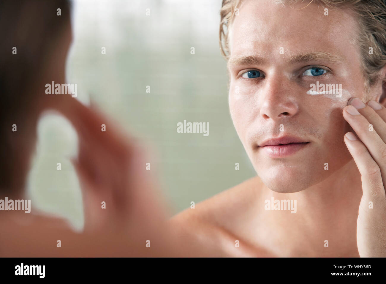 Man Applying Facial Cream Stock Photo - Alamy