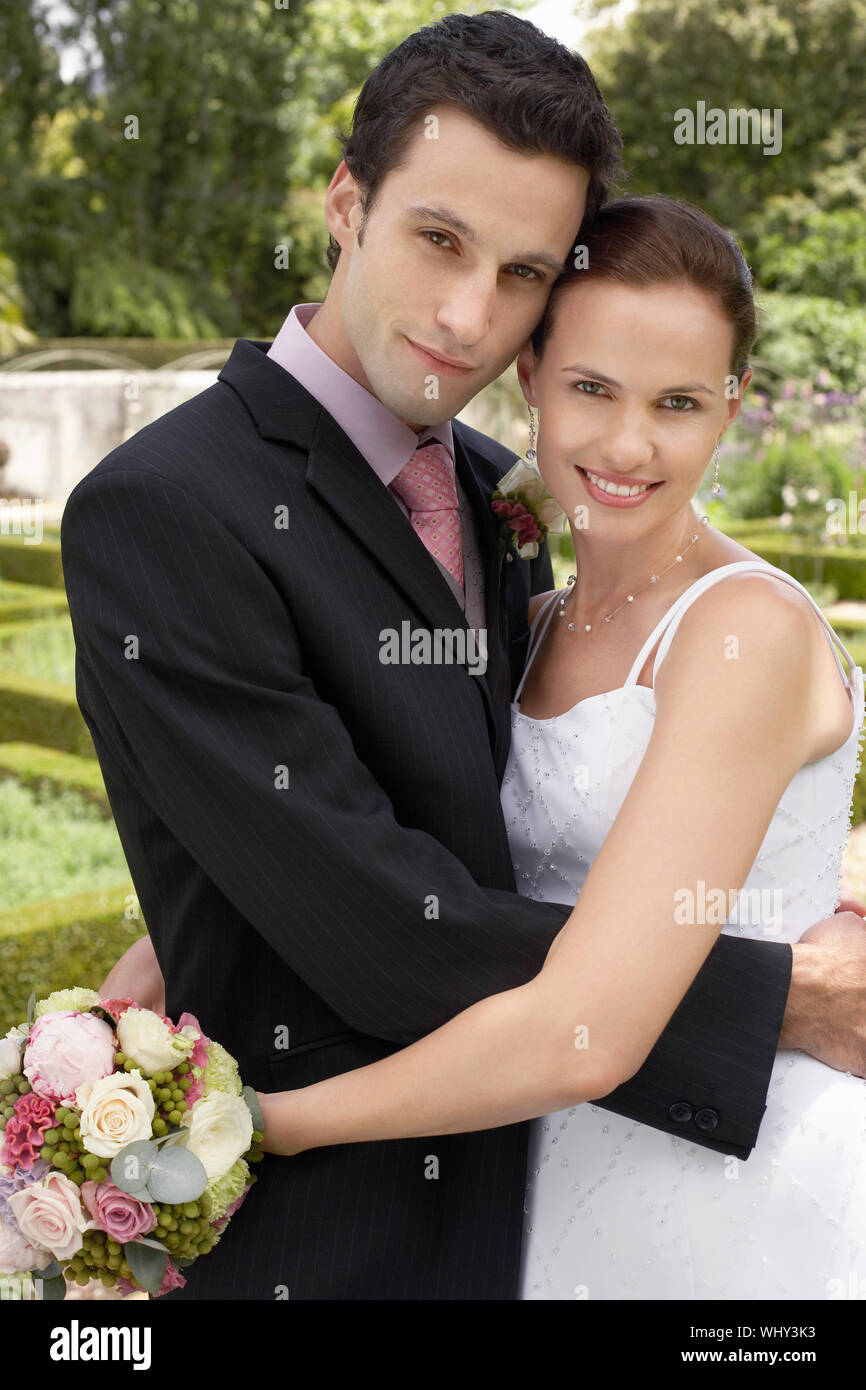 Bride and Groom Hugging Stock Photo - Alamy