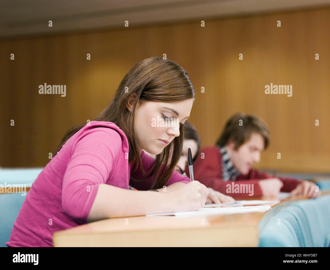 Group of students in lecture room Stock Photo - Alamy