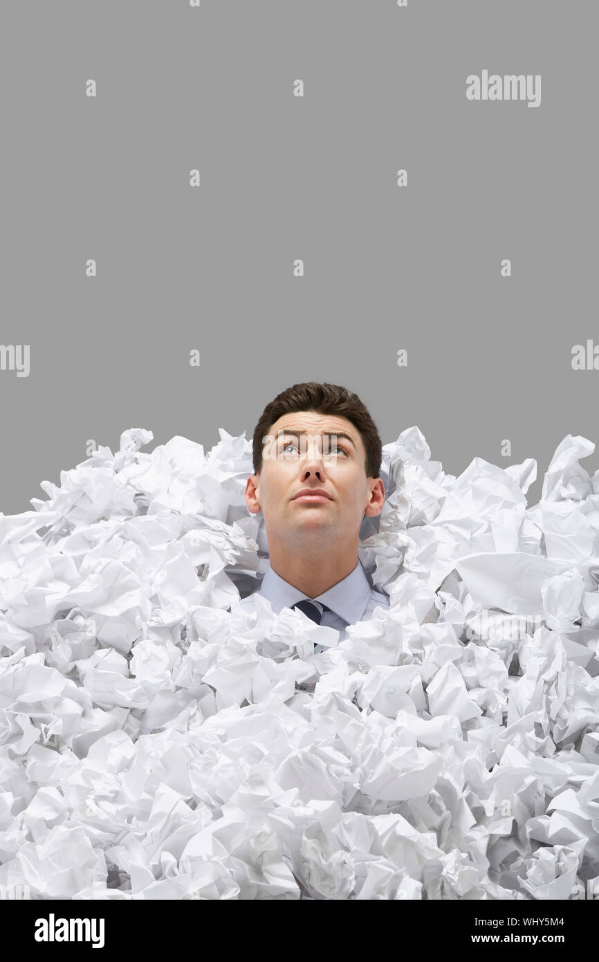 Buried in papers hi-res stock photography and images - Alamy