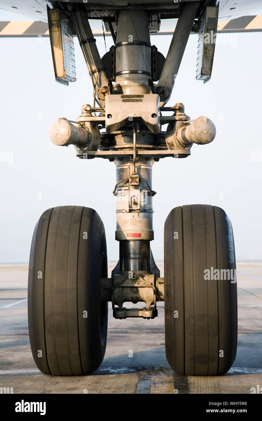 Airplane wheel close-up Stock Photo - Alamy