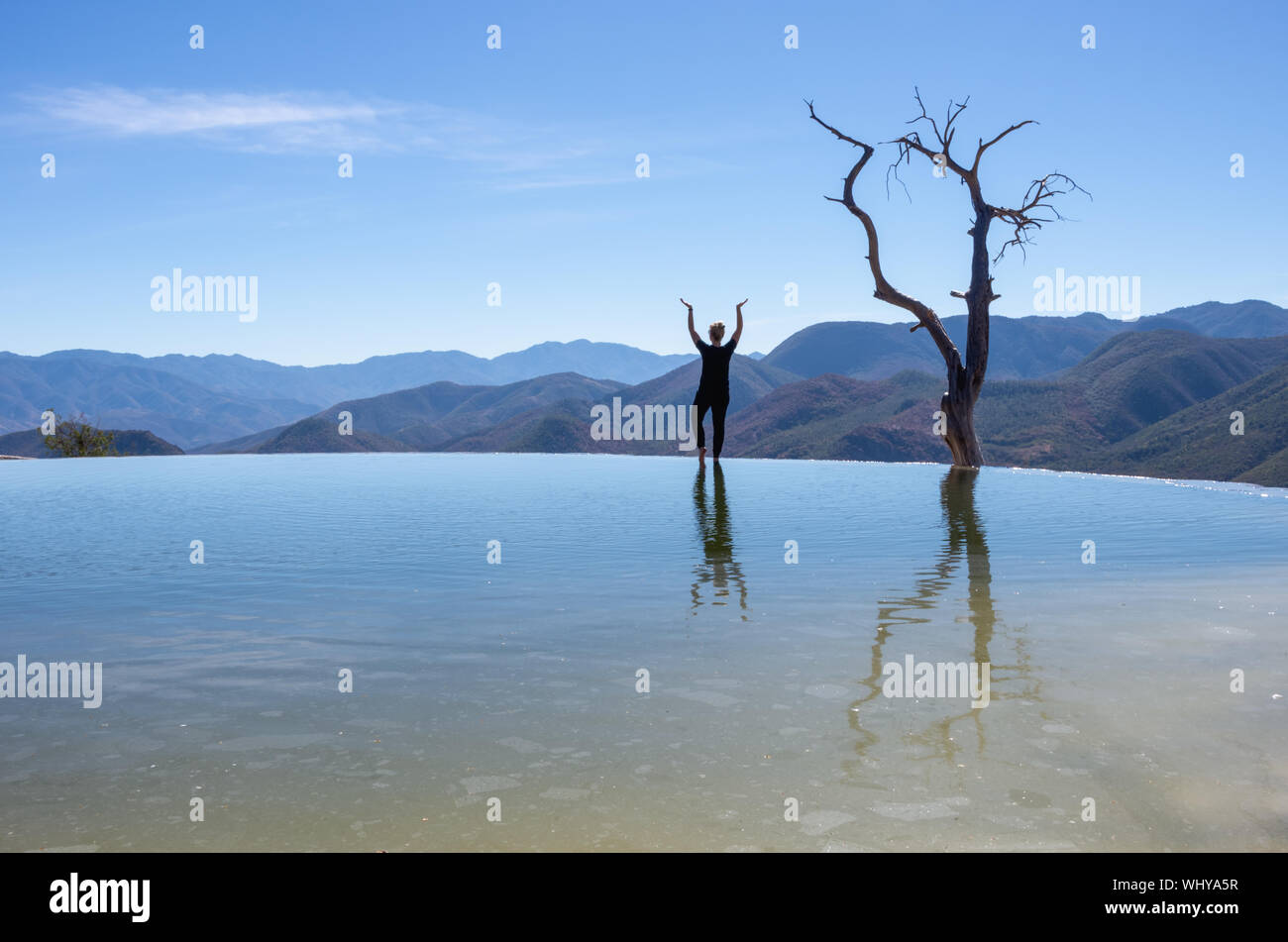 Girl posing at the natural infinity pool of Hierve el Agua, Oaxaca ...