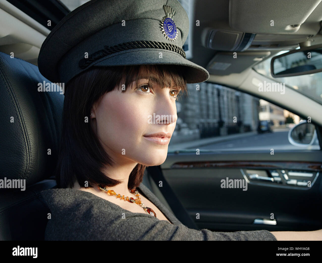 Woman chauffeur hat hi-res stock photography and images - Alamy