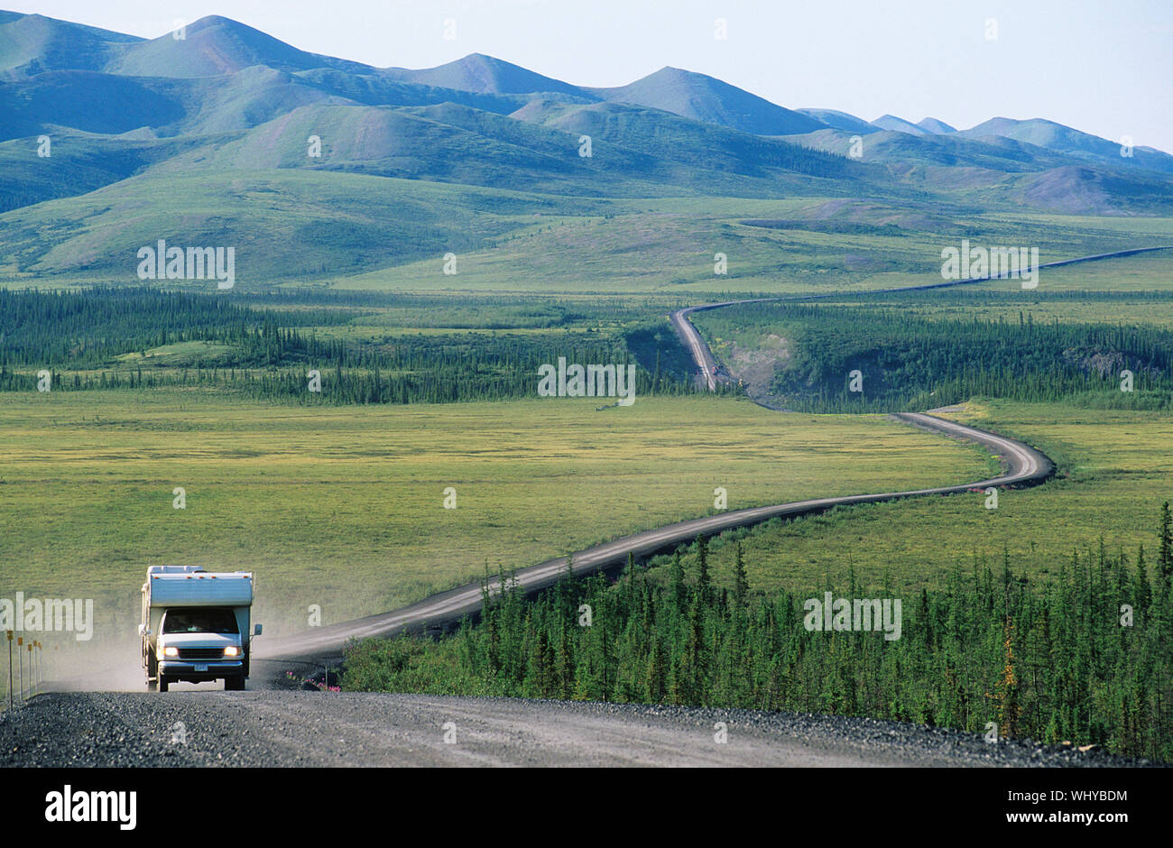 Camper van on rural road Stock Photo - Alamy