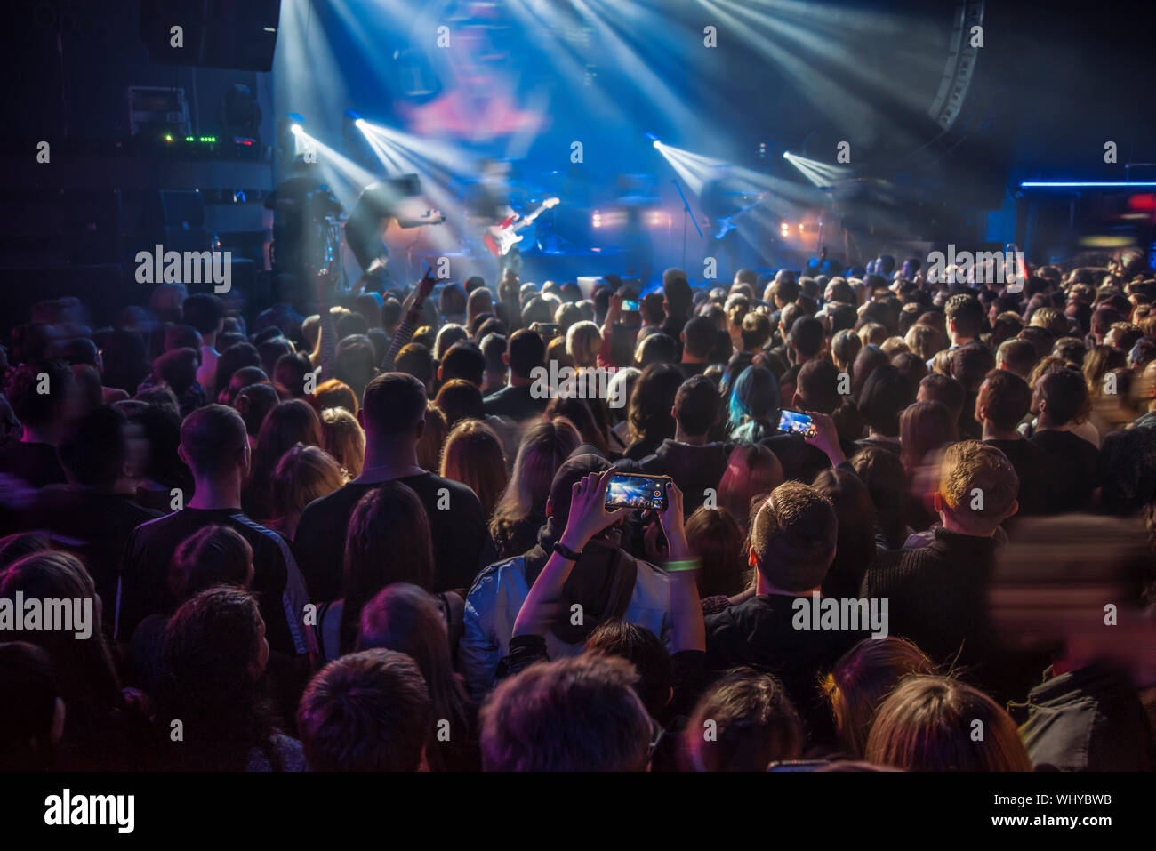 People at the concert are waiting for the show Stock Photo - Alamy