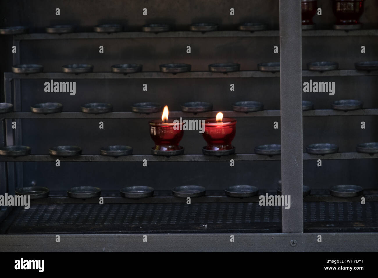 Rack of candles hi-res stock photography and images - Alamy