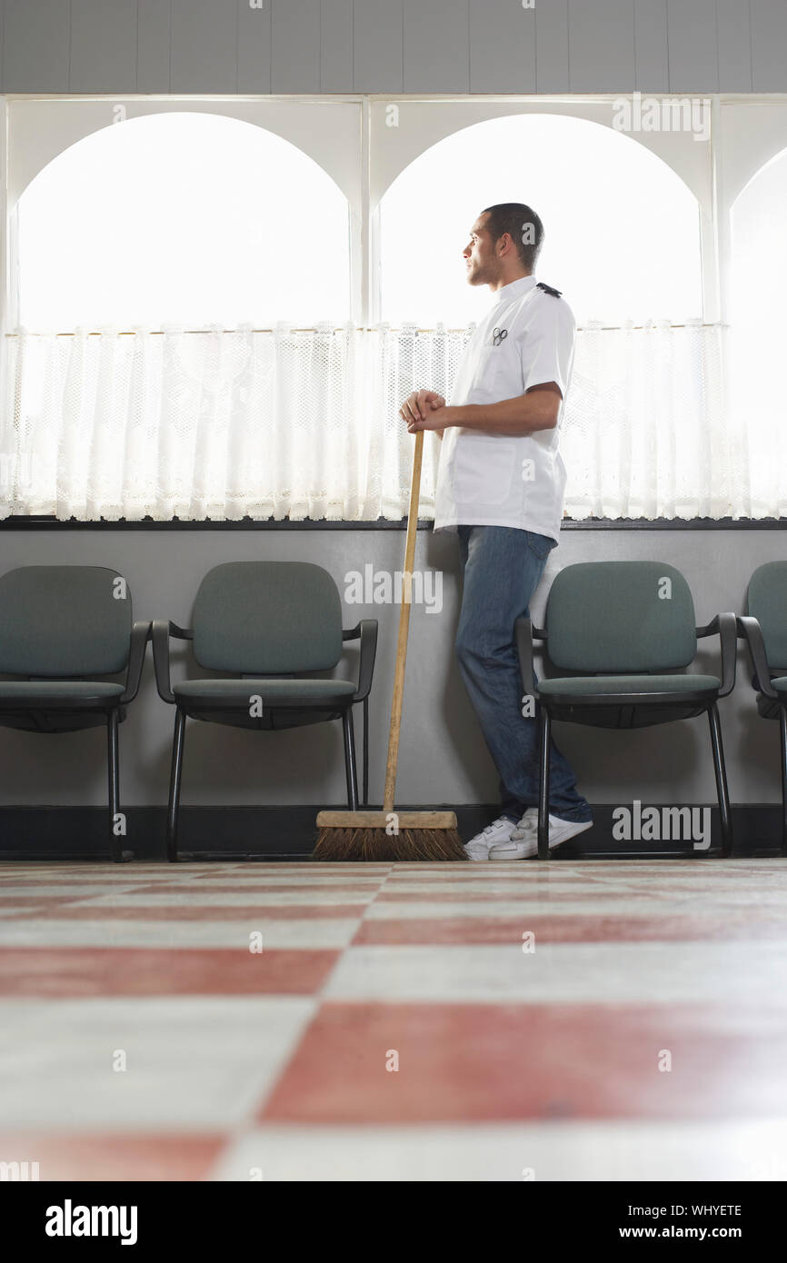 Barber cleaning floor hairdresser salon hi-res stock photography and ...