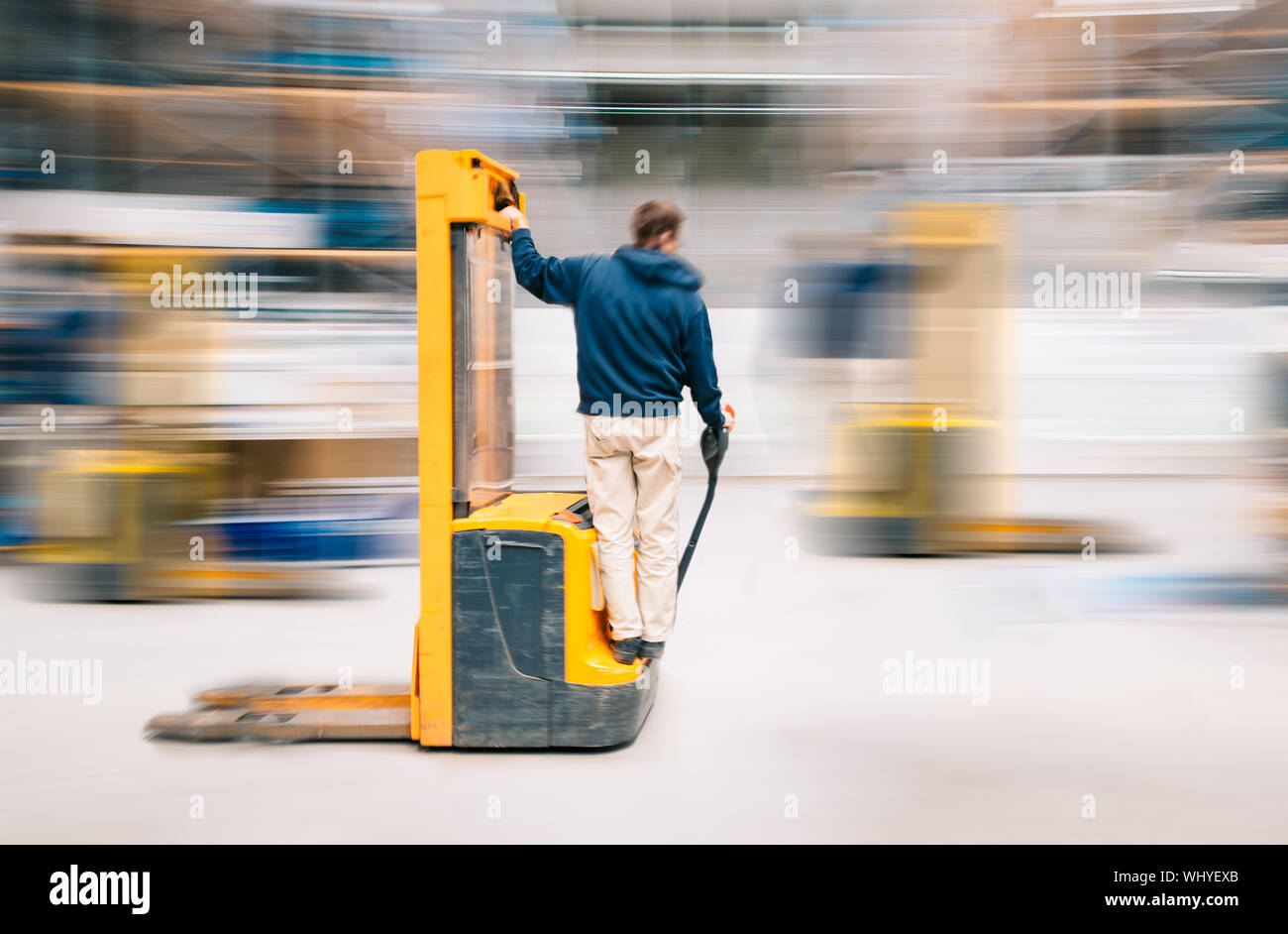Forklift Worker In Motion AT Work in Warehouse | Long Exposure Blurred ...